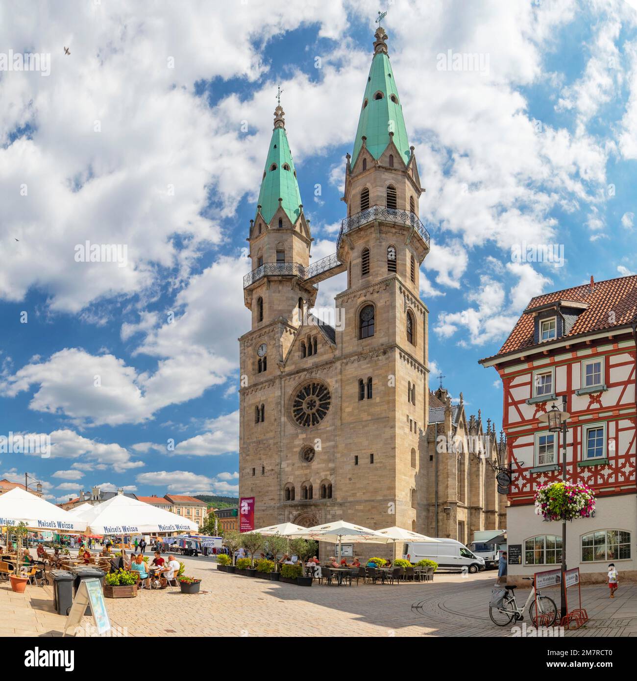 Cafes at the market with the town church of Our Lady, Meiningen ...