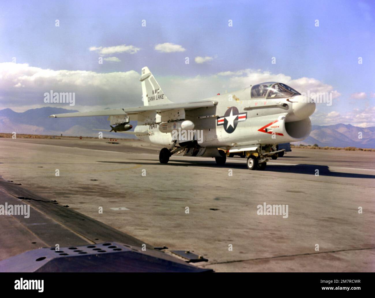 A right front ground view of an LTV A-7E Corsair II aircraft with a ...