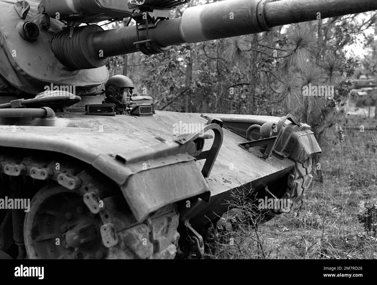 An M-60A1 tank and driver from Company D, 8th Tank Battalion, are ...