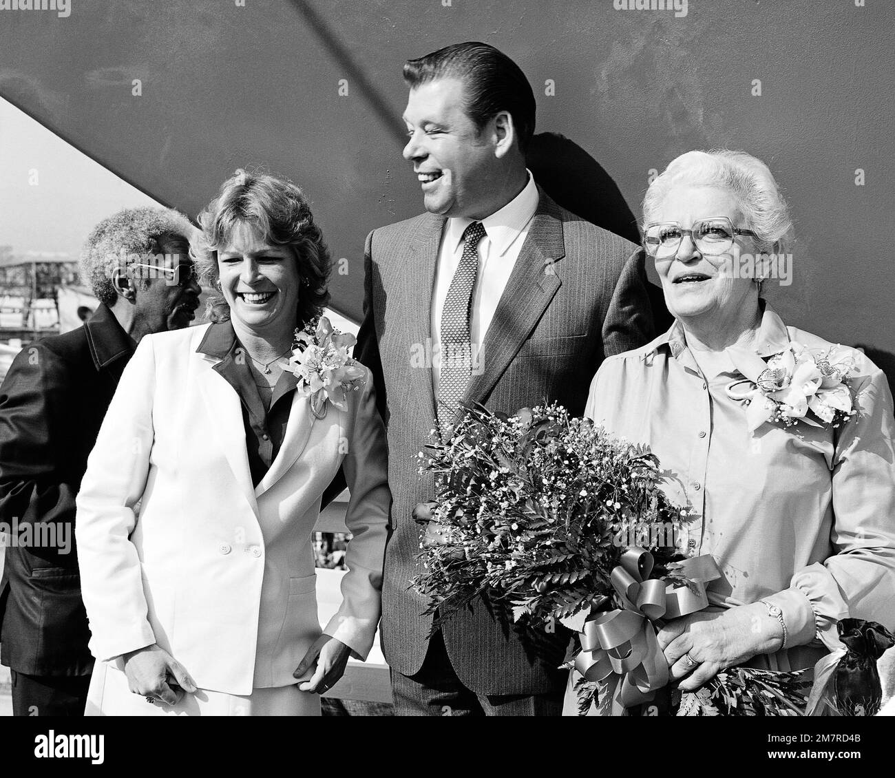 Mrs. Kenneth J. Sanger, sponsor, right; Hans Schaefer, general manager ...