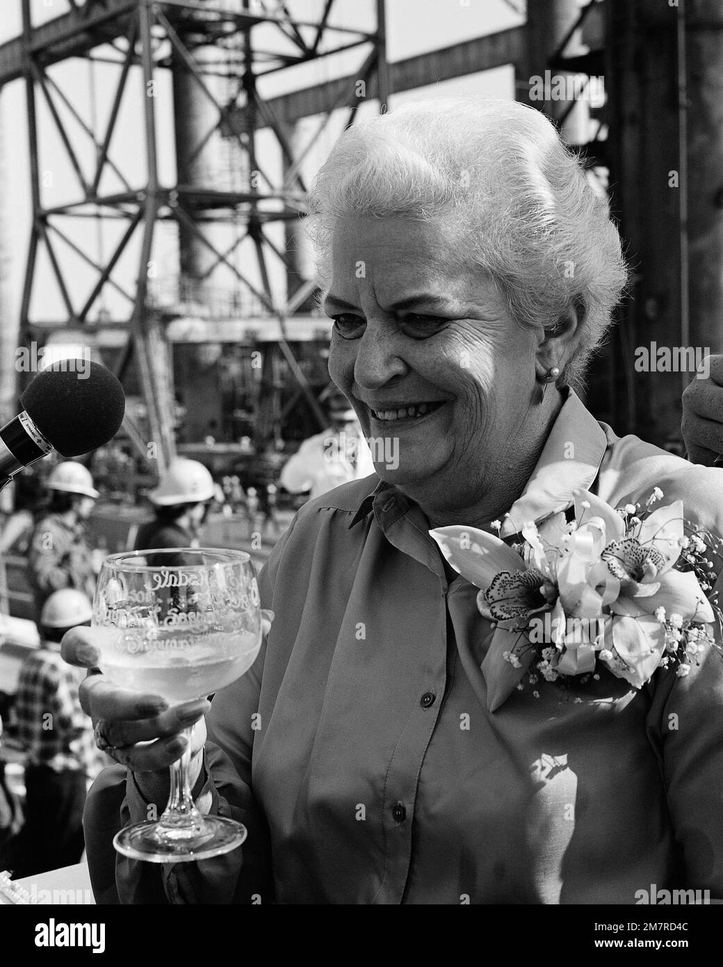 Mrs. Kenneth J. Sanger, sponsor, enjoys refreshments during the ...