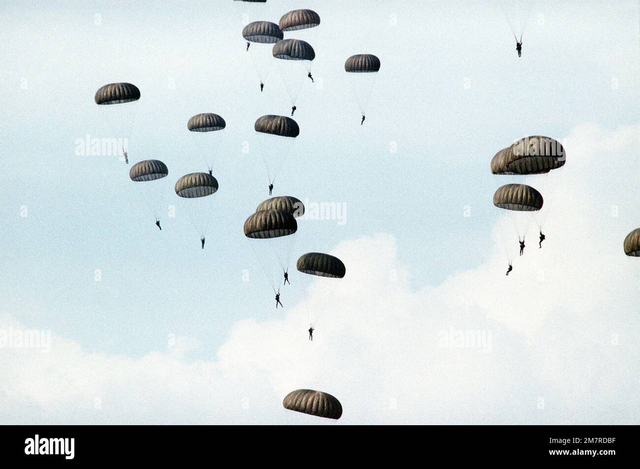Air Force Reserve flight surgeons descend after jumping from a C-141 ...