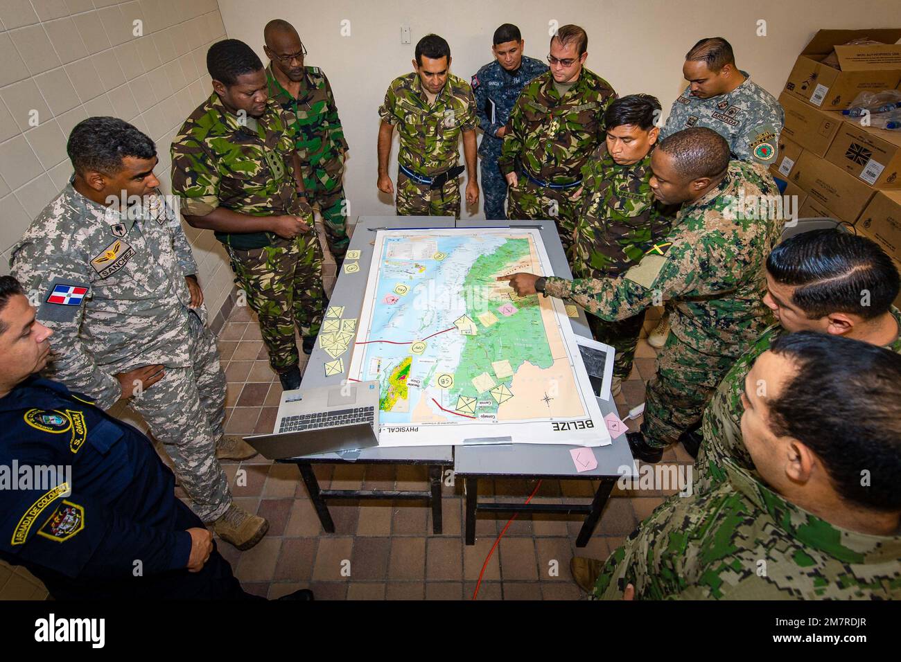 Major Webster Williams (Jamaica Defence Force, pointing at map) and members of the Caribbean ...