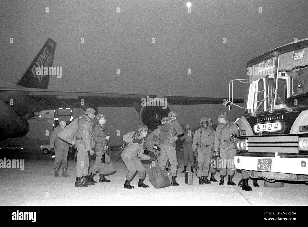 U.S. Army soldiers are airlifted to Osan by the Flying Tiger Airlines ...