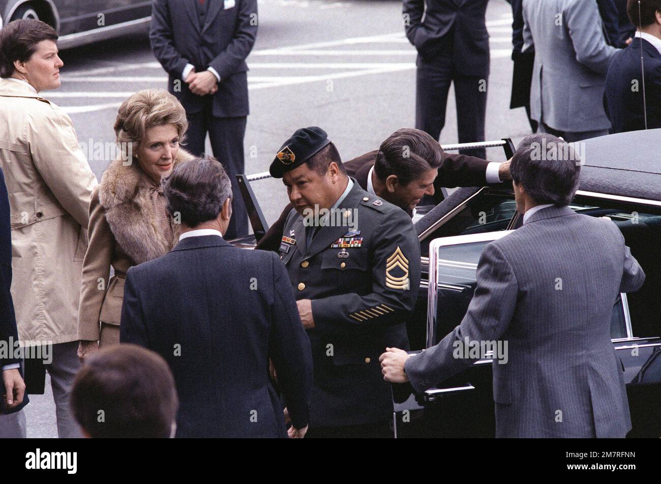 President Ronald Reagan, beside the car, and Medal of Honor recipient ...