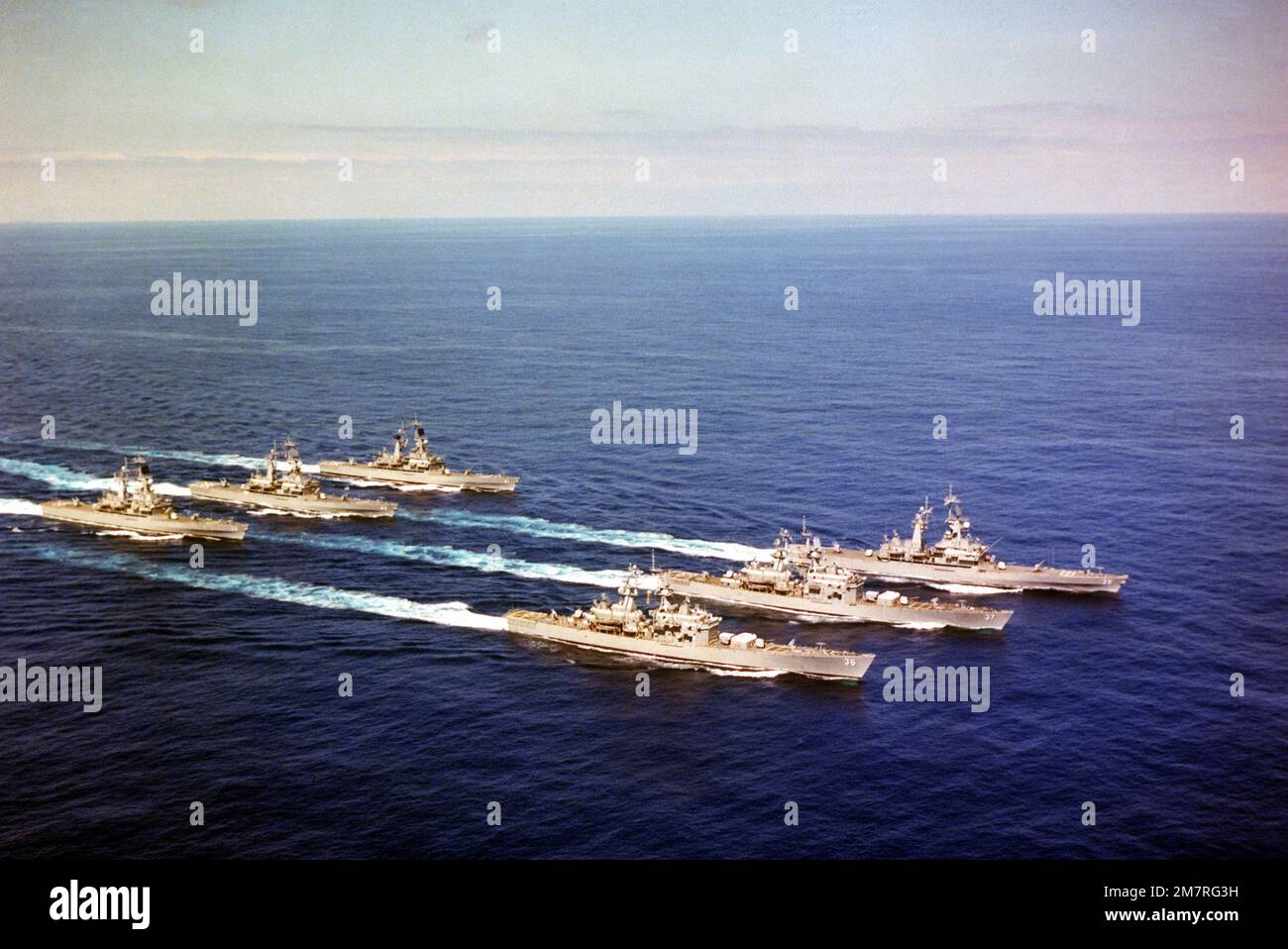 An aerial starboard bow view of six nuclear-powered guided missile ...
