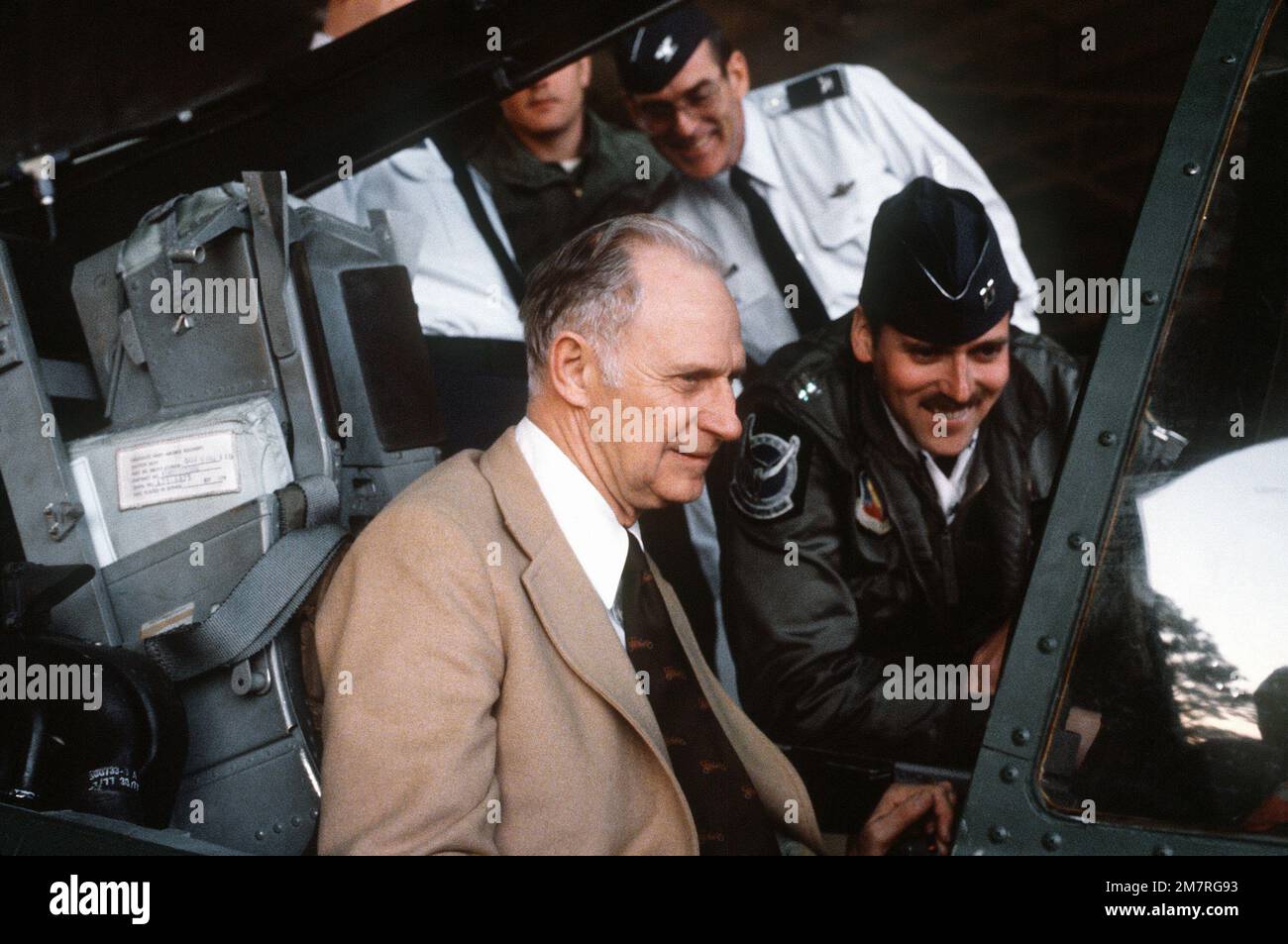 Secretary of Air Force Verne Orr views AGM-65 Maverick missile ...