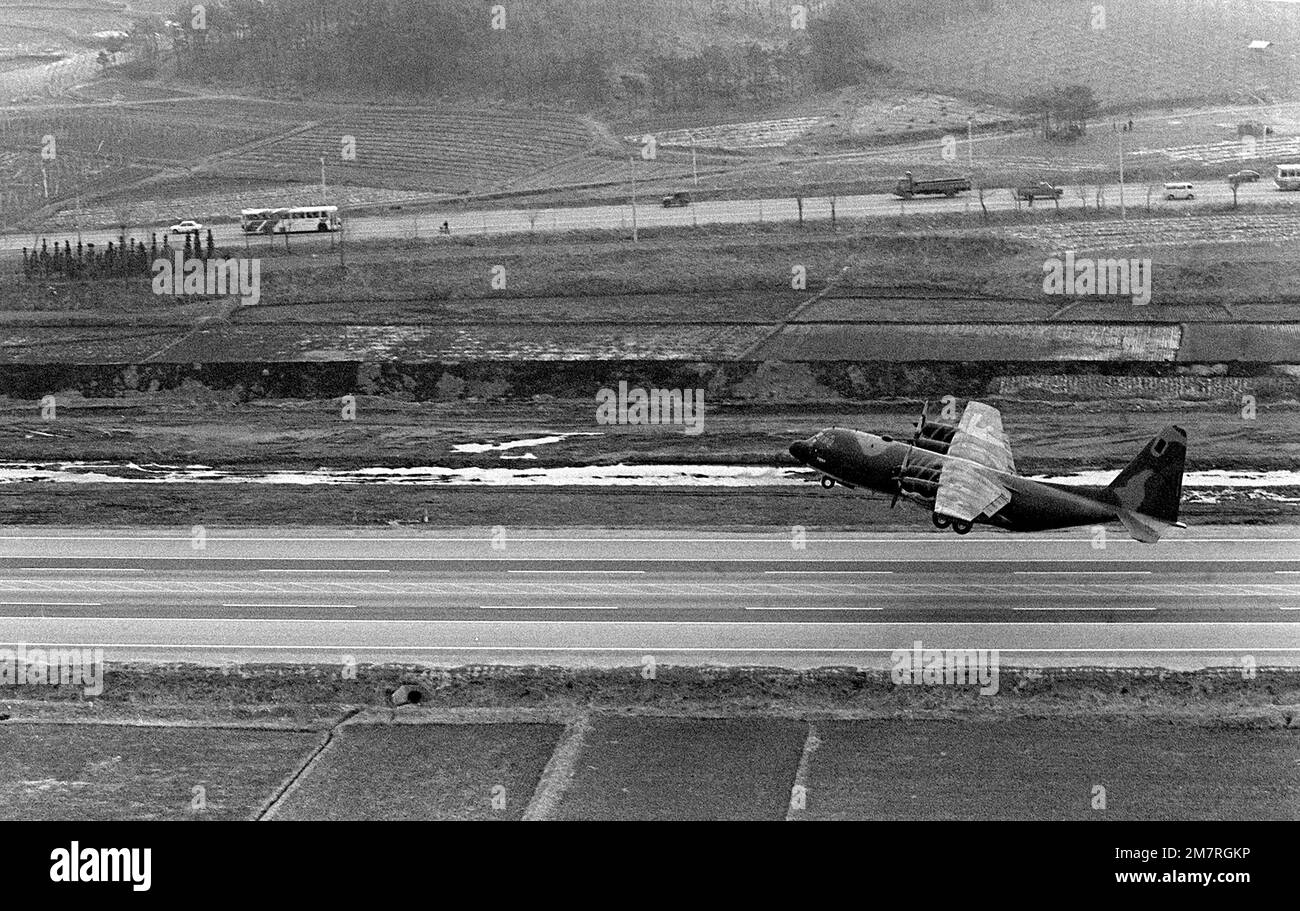 Left side view of a Korean Air Force C-130 Hercules aircraft taking off ...