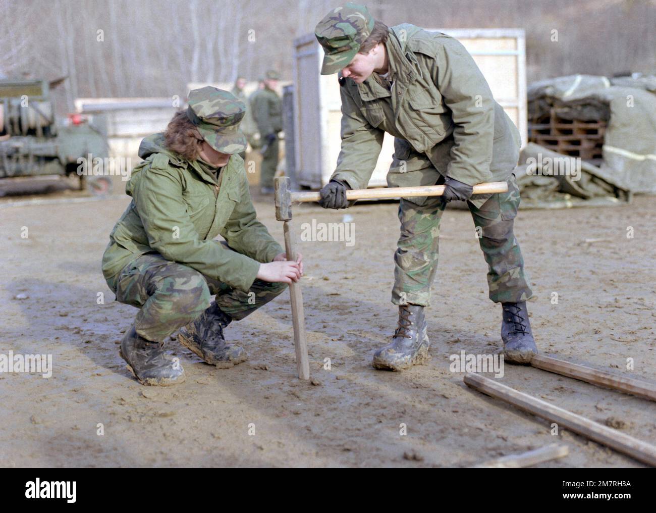 Two female Marines of Marine Aircraft Group 12 (MAG-12) do their share ...