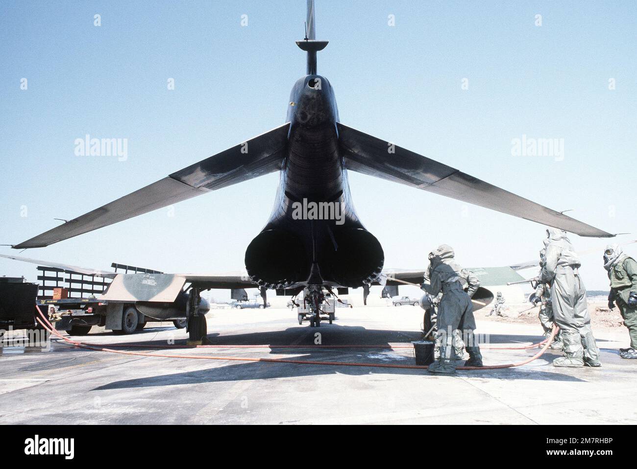 Members of the 8th Security Police Squadron, clad in chemical warfare ...