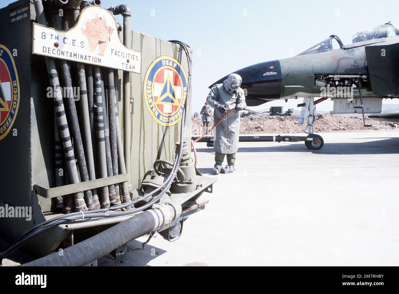 Members of the 8th Security Police Squadron, clad in chemical warfare ...