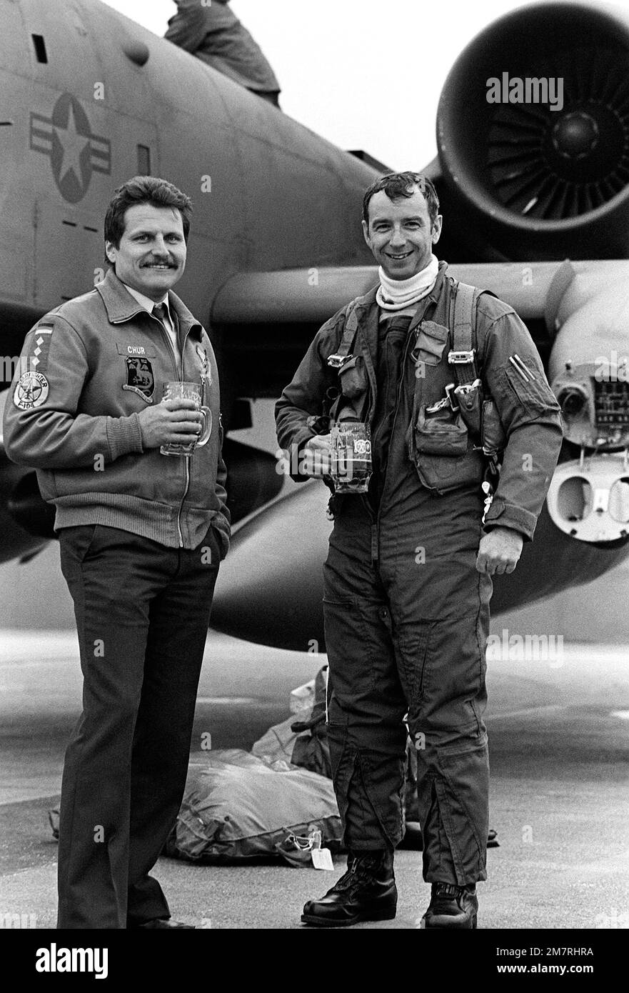 A German and an American pilot enjoy the traditional beer after ...