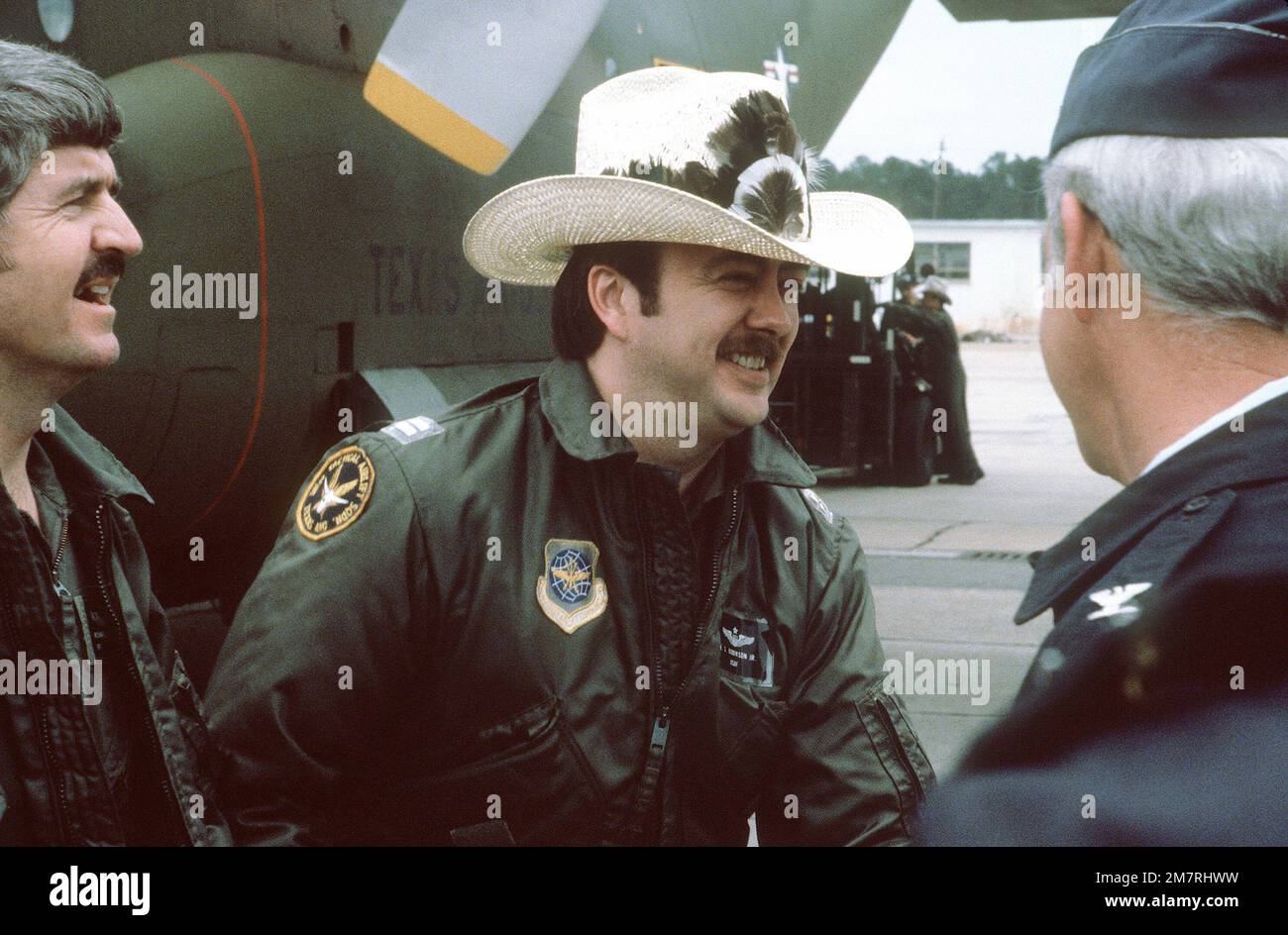 CPT W. S. Robinson and his associate meet with Air Force officers ...