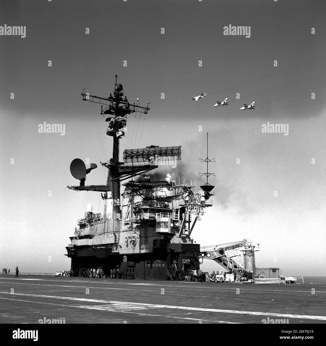 A close-up view of the island of the aircraft carrier USS CORAL SEA (CV ...