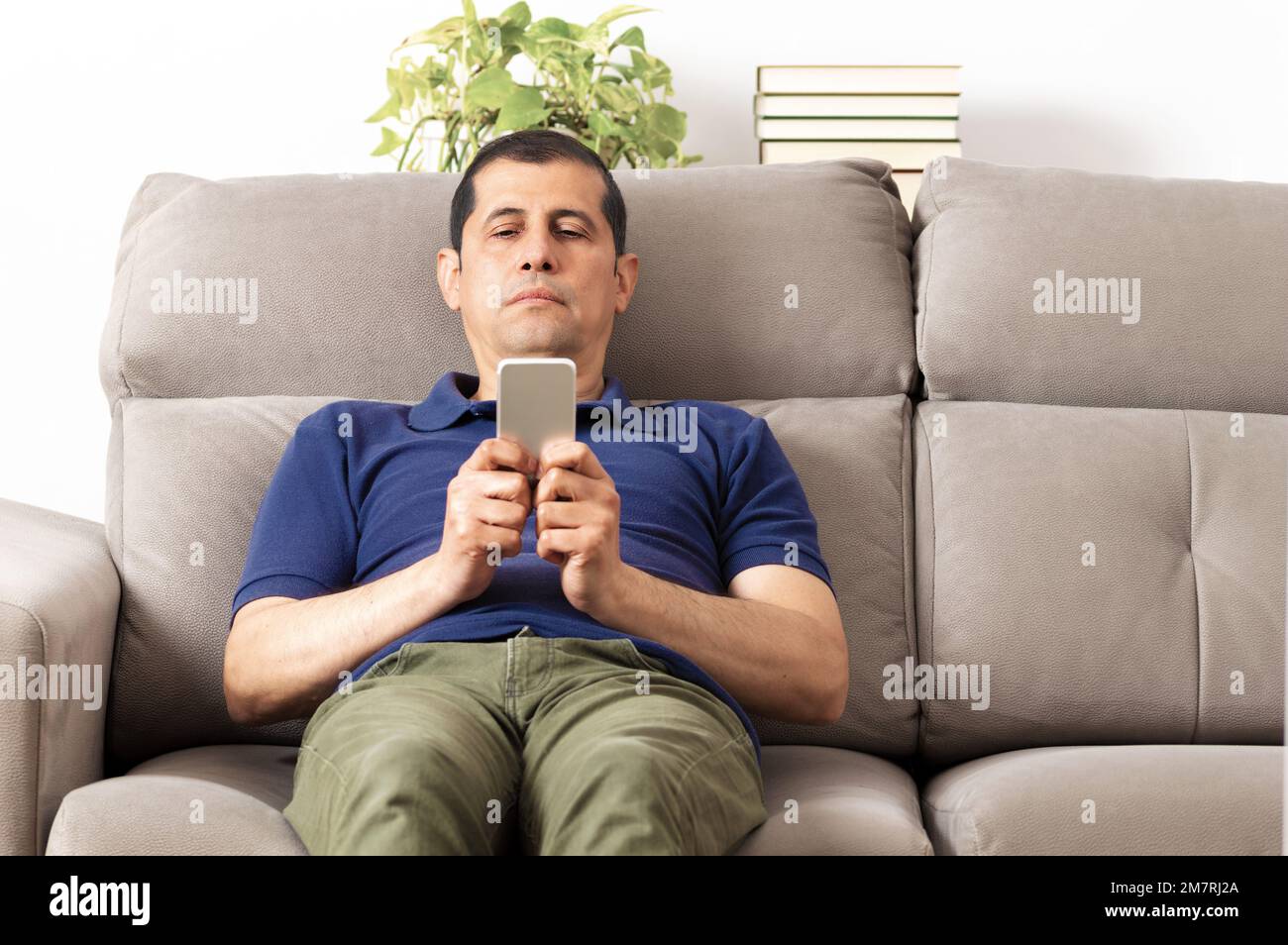 Serious man checking time hand hi-res stock photography and images - Alamy