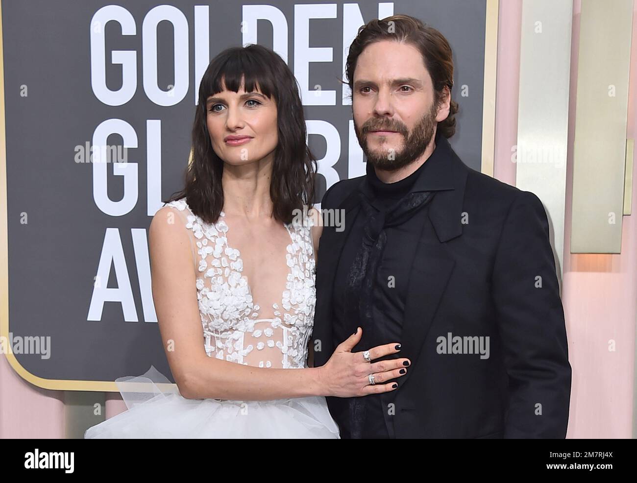 Felicitas Rombold, left, and Daniel Brühl arrive at the 80th annual ...