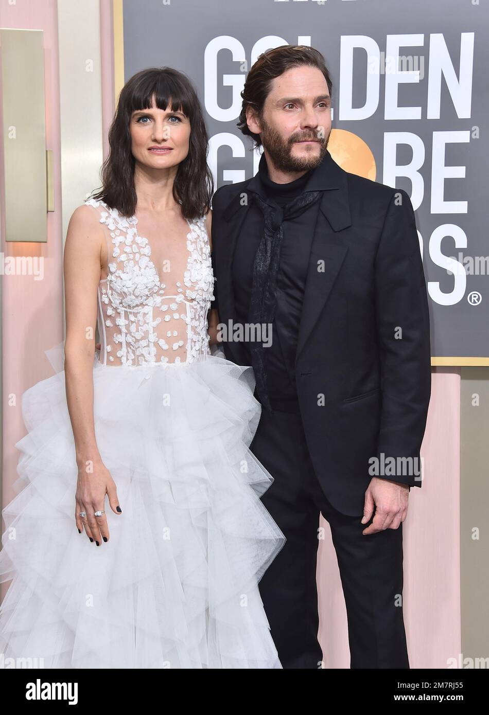 Felicitas Rombold, left, and Daniel Brühl arrive at the 80th annual ...