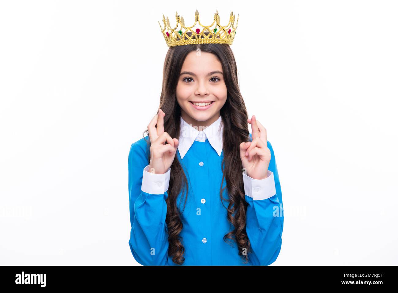 Girls birthday party, funny kid in crown. Imagine herself a queen ...