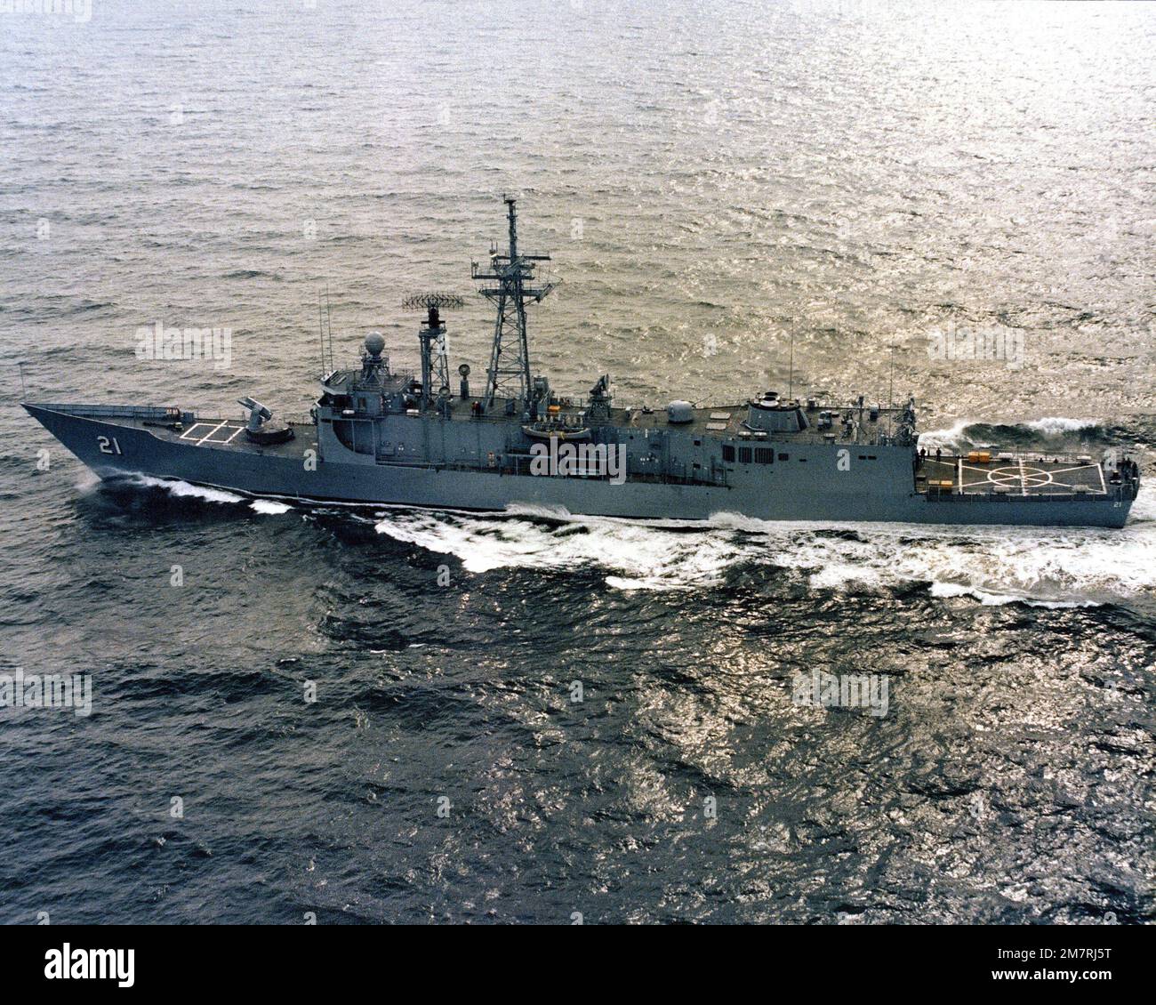 Aerial port beam view of the Oliver Hazard Perry class guided missile ...