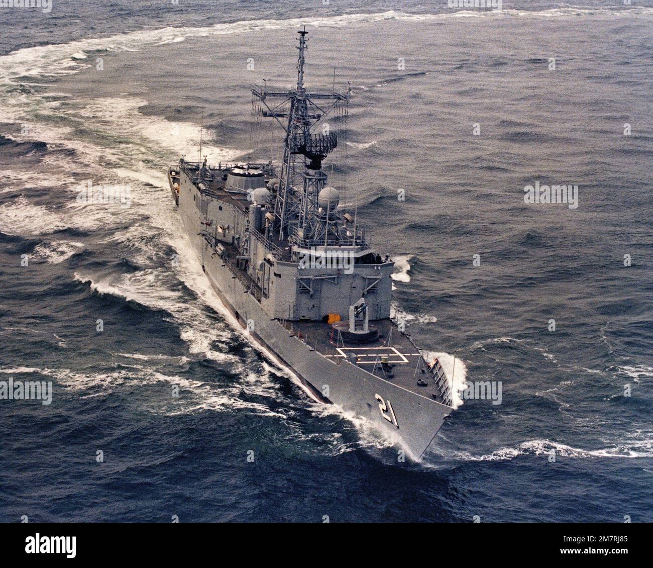 An aerial starboard bow view of the Oliver Hazard Perry class guided ...