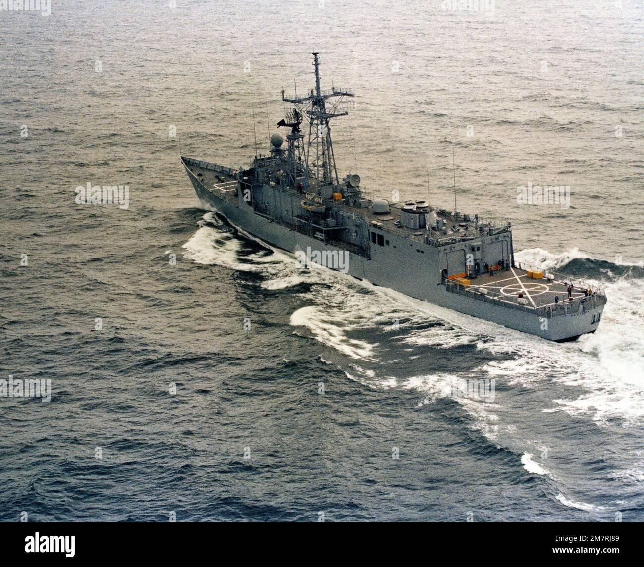 Aerial port quarter view of the Oliver Hazard Perry class guided ...