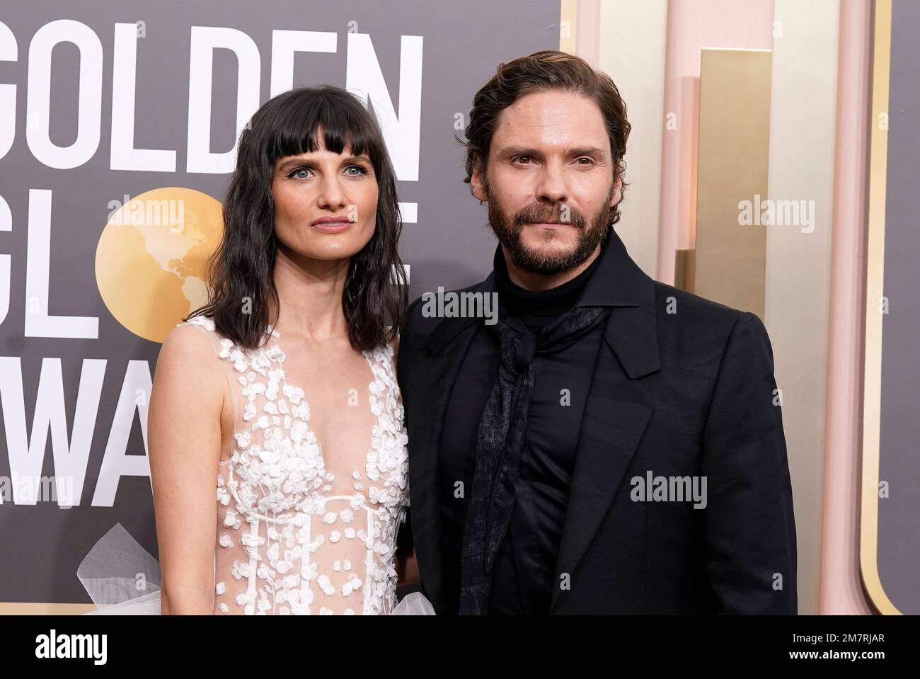 Felicitas Rombold, left, and Daniel Bruhl arrive at the 80th annual ...