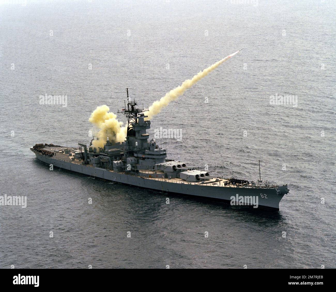 Aerial starboard bow view of the battleship USS NEW JERSEY (BB 62 ...