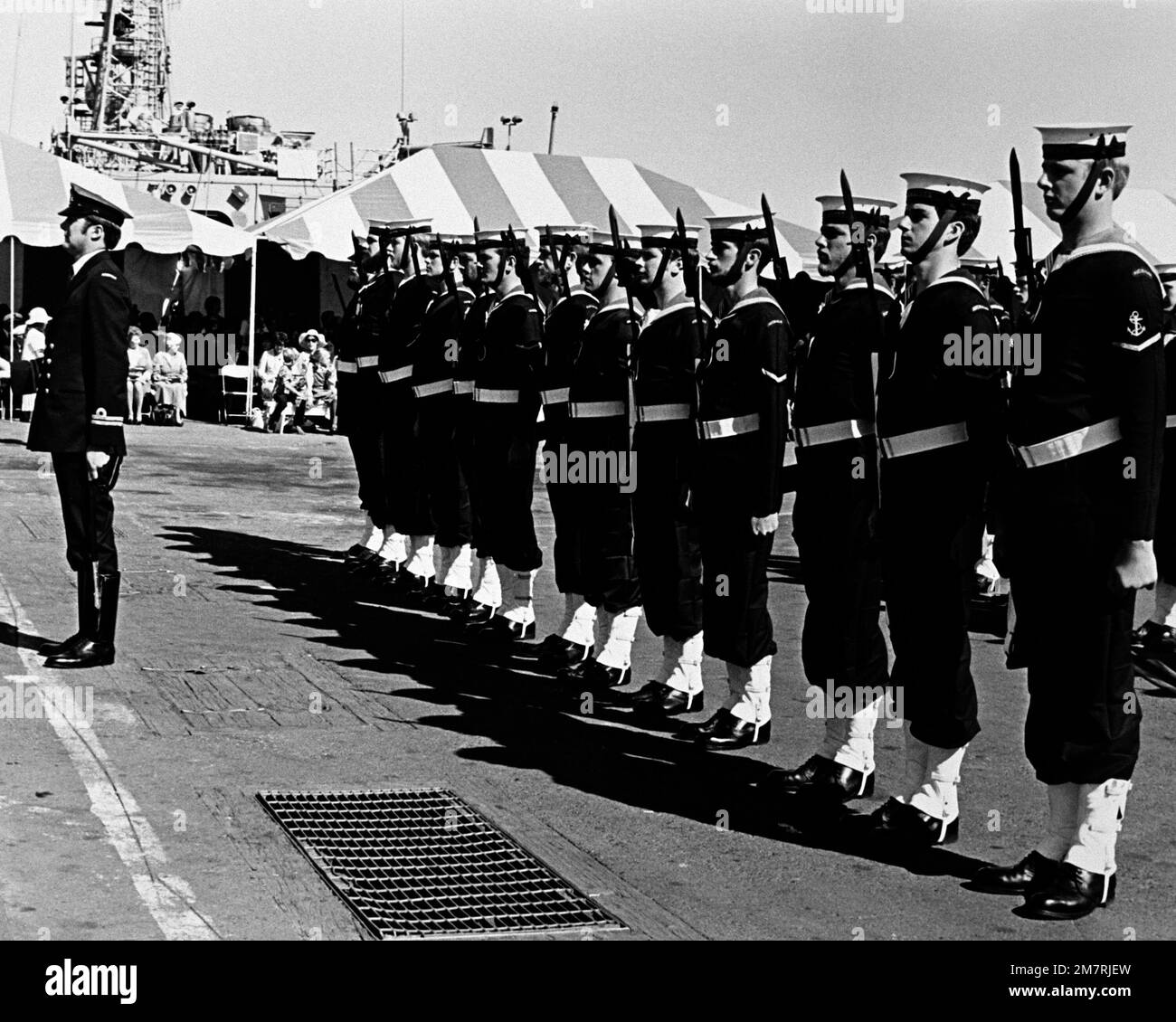 A Royal Australian Navy guard squad stands at attention during the ...