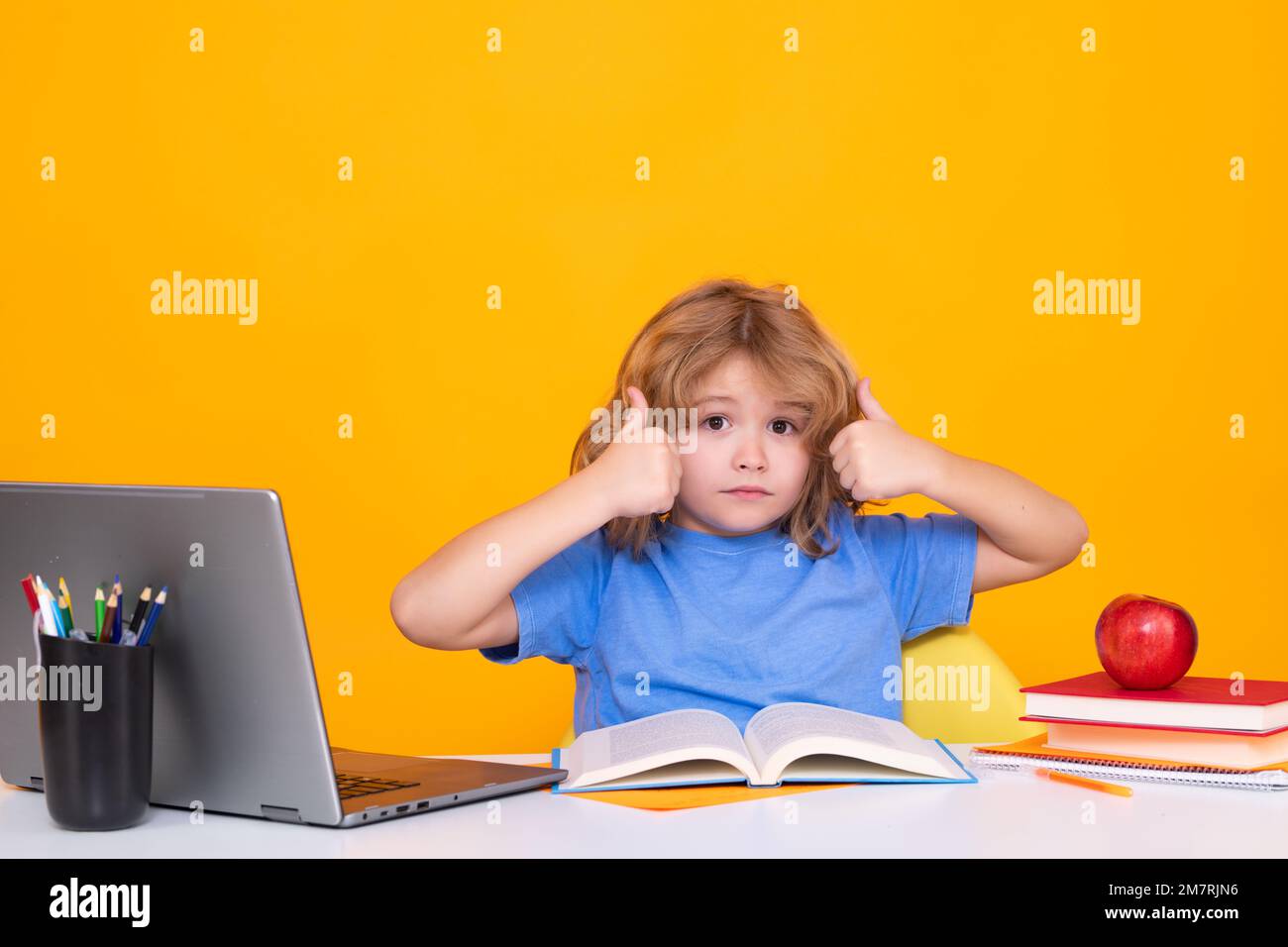 Little student school child isolated on studio background. Portrait of ...