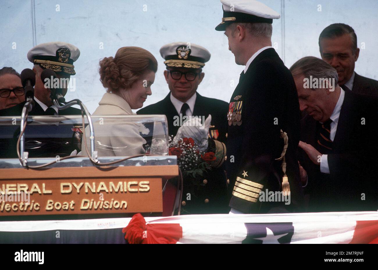 Mrs. Henry Jackson receives flowers from CAPT Thomas H. Anderson ...