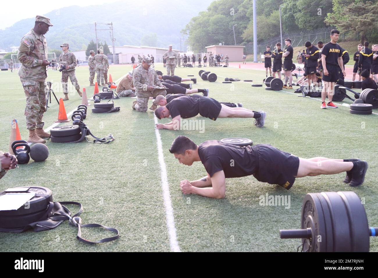 U.S. Army soldiers hold plank positions during an Army Combat Fitness ...