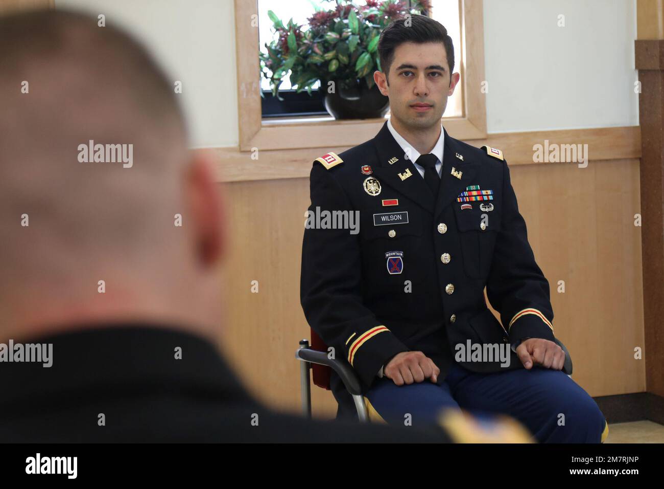 U.S. Army Capt. Nicholas Wilson awaits questioning during a military ...