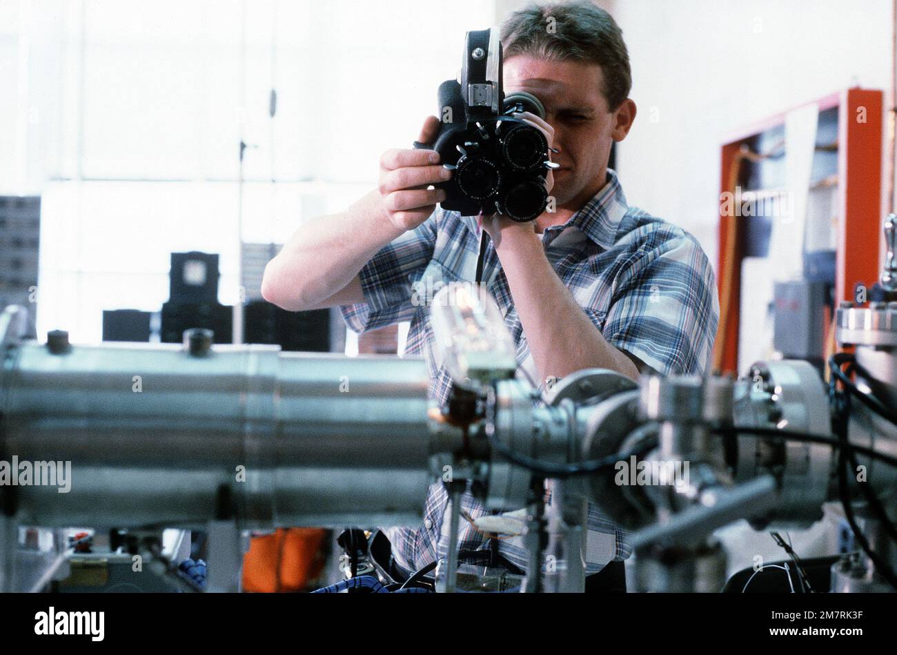 A motion picture cameraman assigned to Detachment 7, 1361st Audiovisual ...
