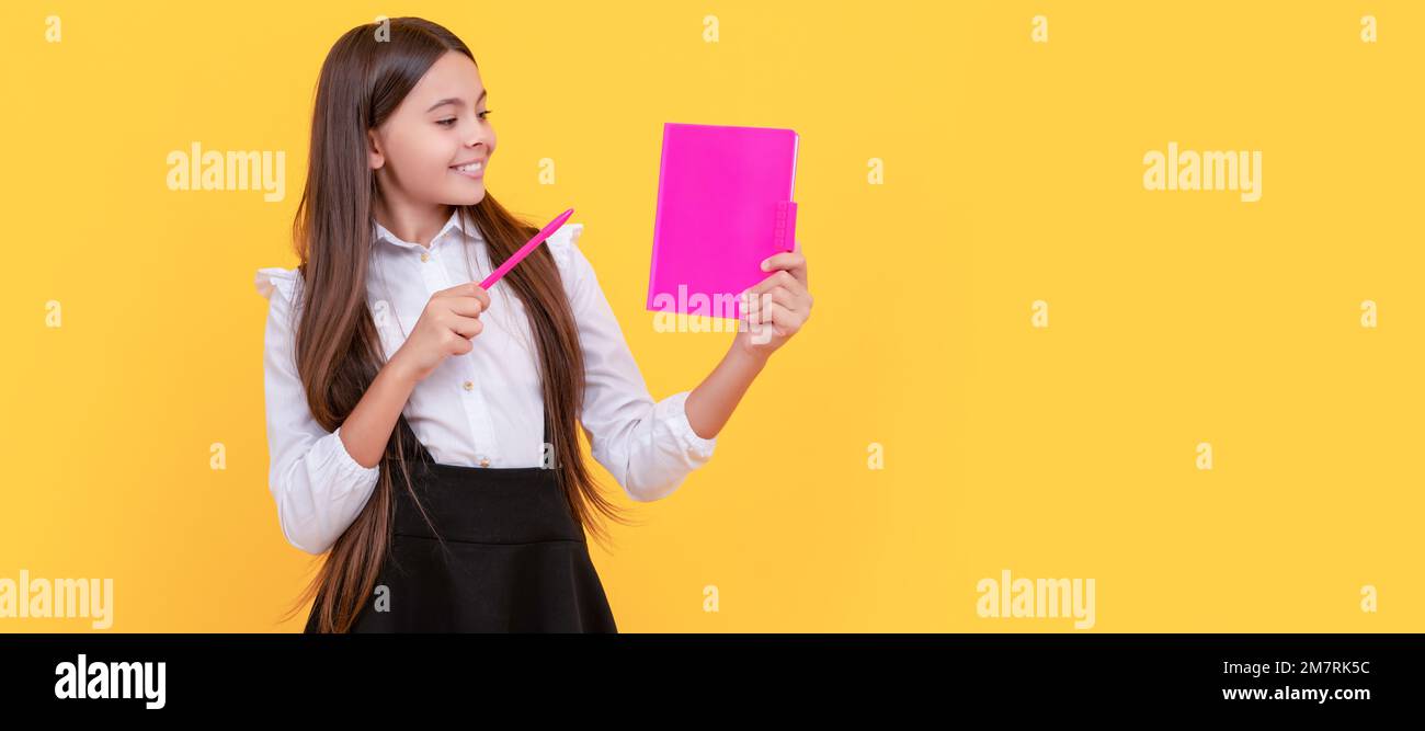 Learn to write. Happy kid point pen at book. School education. Starting ...