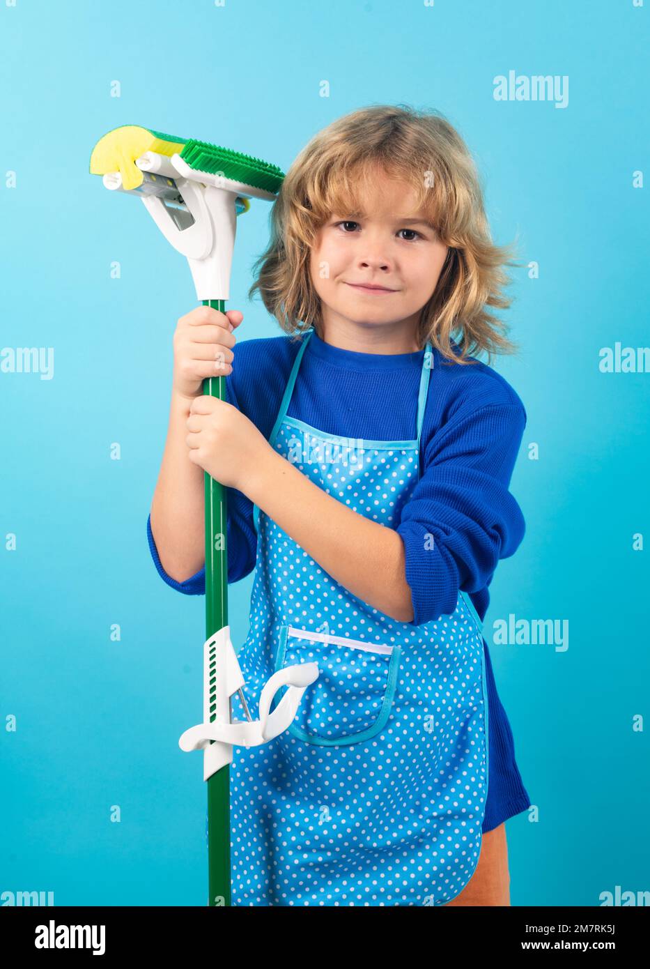 Child doing housework. Little kid cleaning at home. Child doing ...