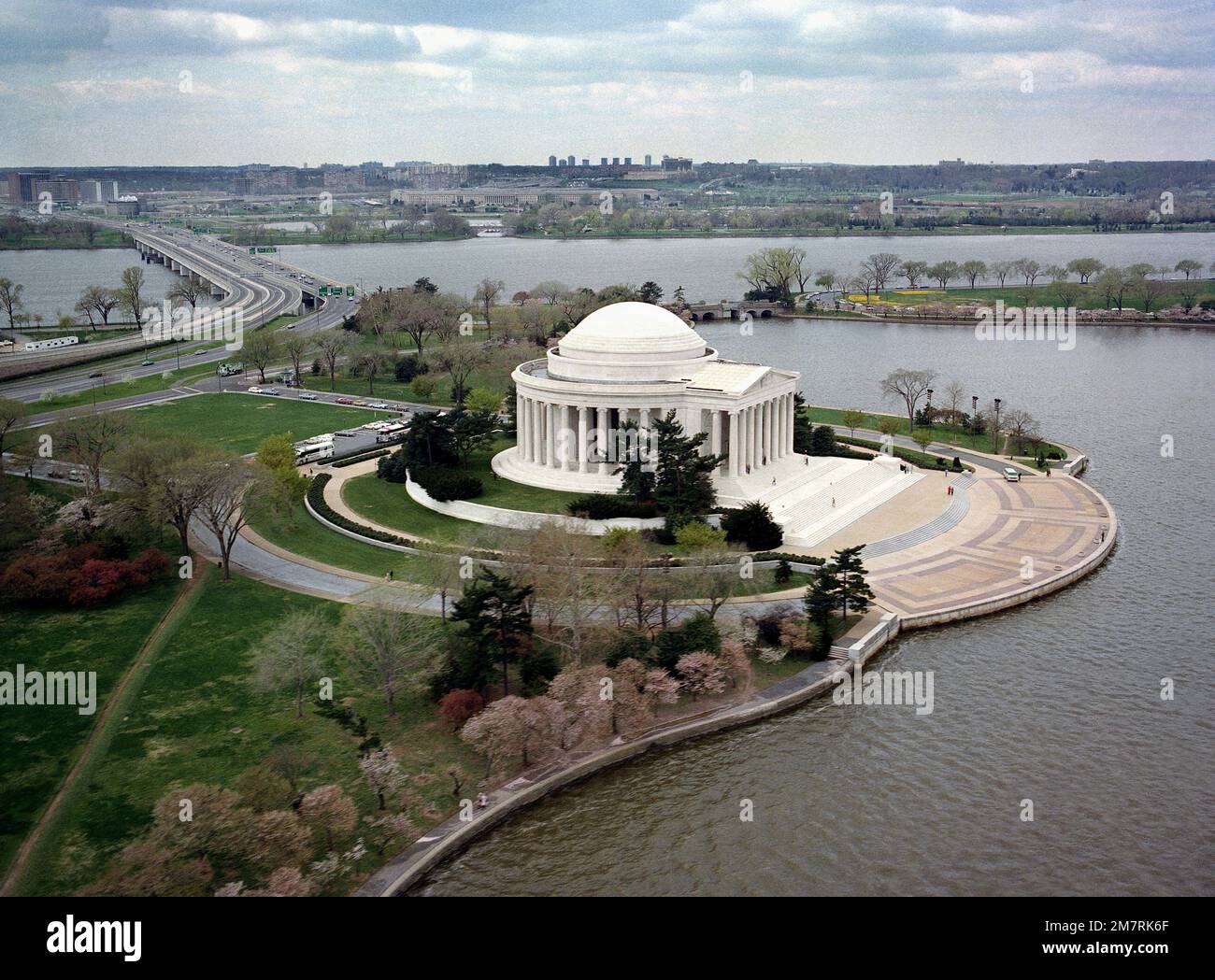 An aerial side view of the Jefferson Memorial with blossoming cherry ...