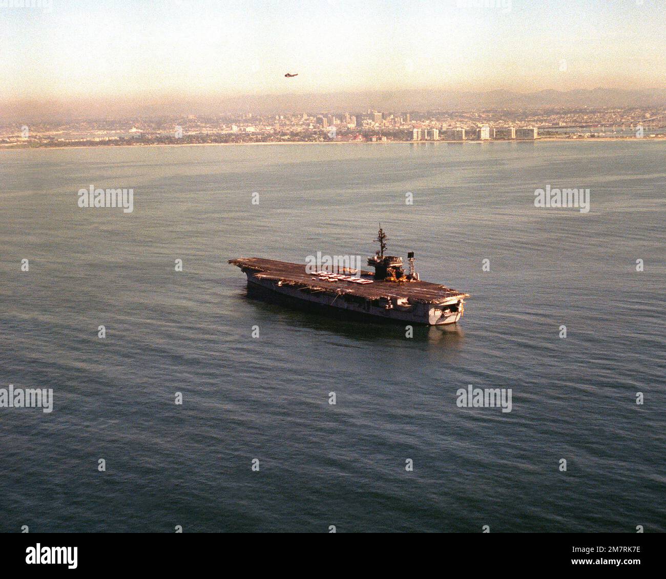 A port quarter view of the USS KITTY HAWK (CV-63) as crewmen form the ...