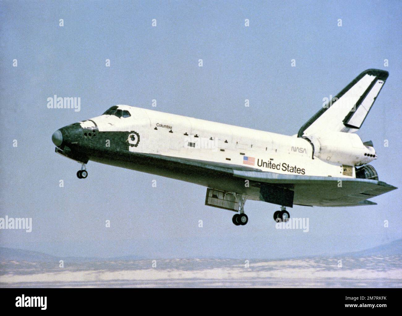 A left side view of the space shuttle Columbia preparing to land after ...