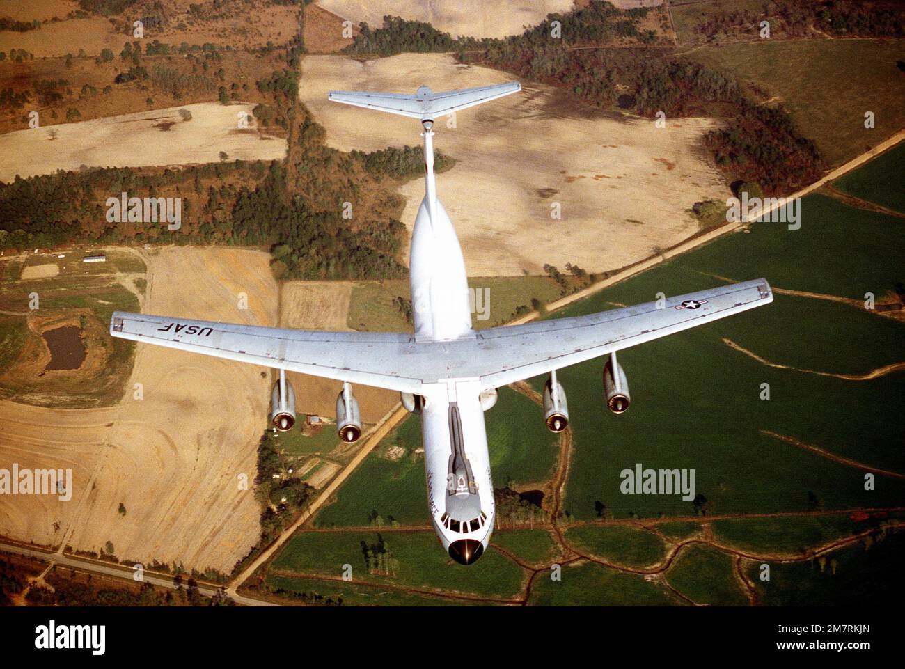 AN air-to-air front view of a 63rd Military Airlift Wing C-141B ...