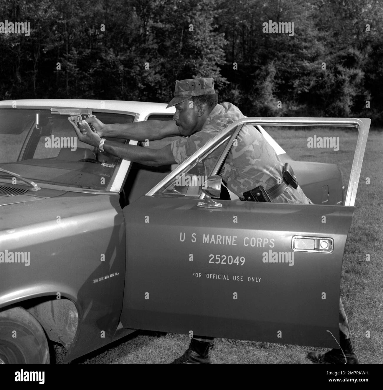 SGT H.L. Fliggins, a military policeman, shows how to use an automobile ...