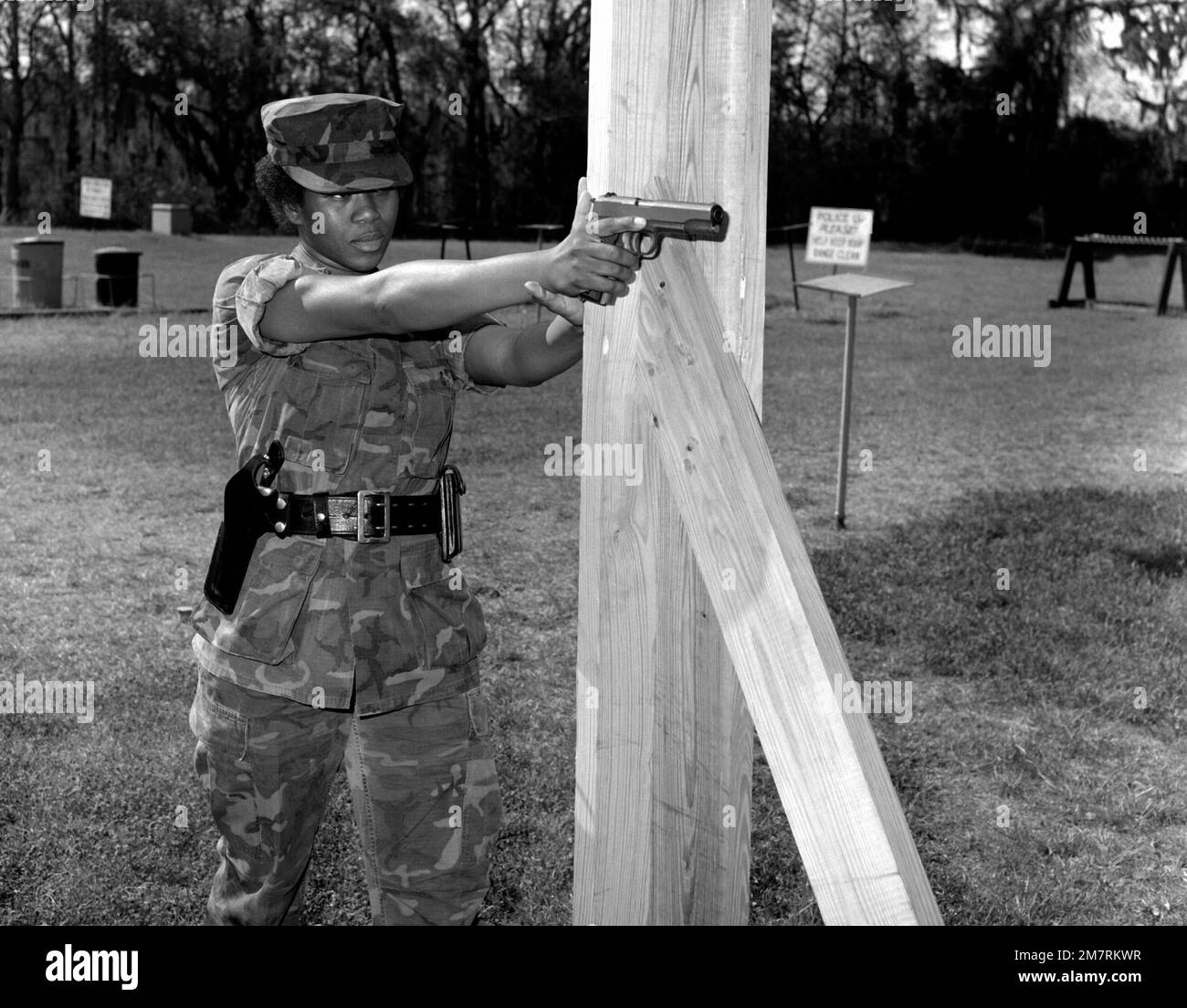LT. CPL. A. J. Nesbit, a military policewoman, practices firing the ...