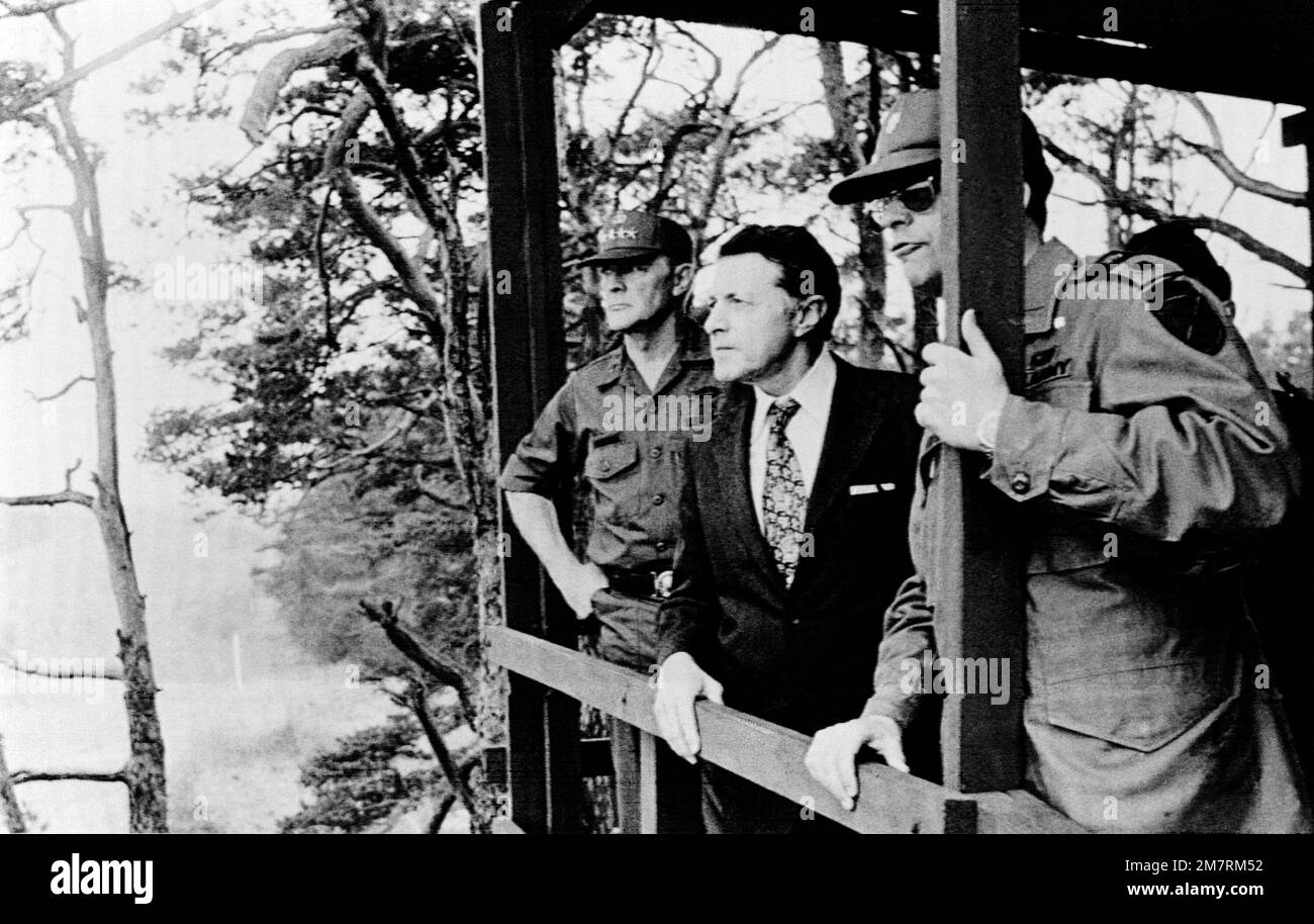 Secretary of Defense Caspar W. Weinberger accompanied by General ...