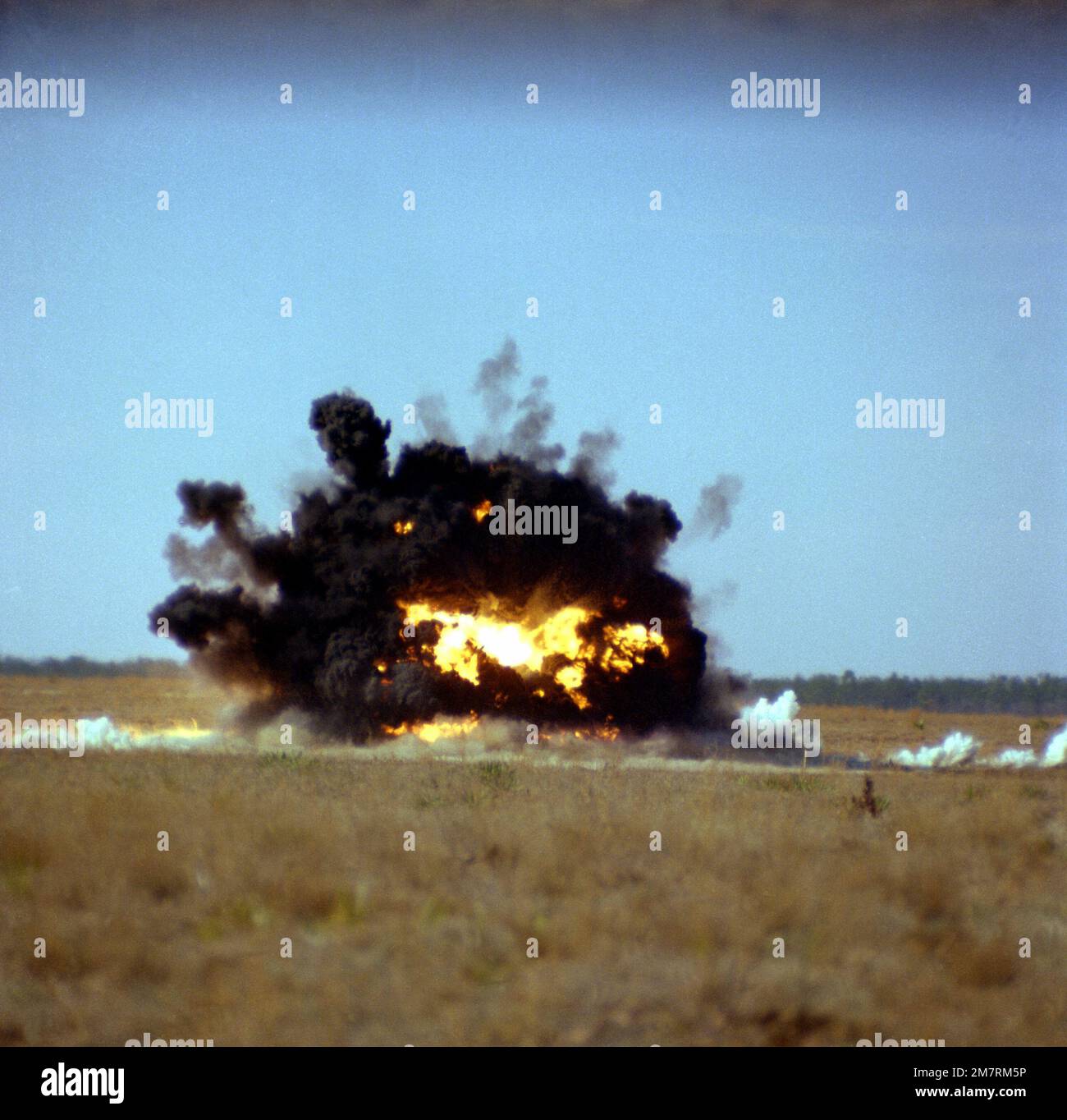 A view of the explosion caused by an AGM-65 Maverick missile destroying ...