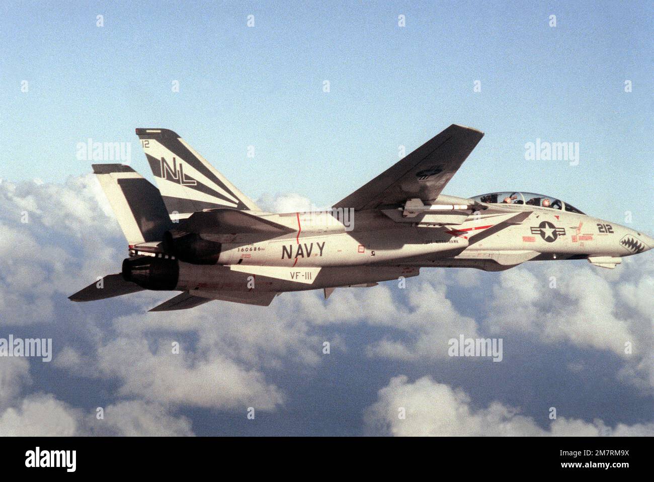 An air-to-air right side view of an F-14A Tomcat aircraft from Fighter Squadron 111 (VF-111 ...