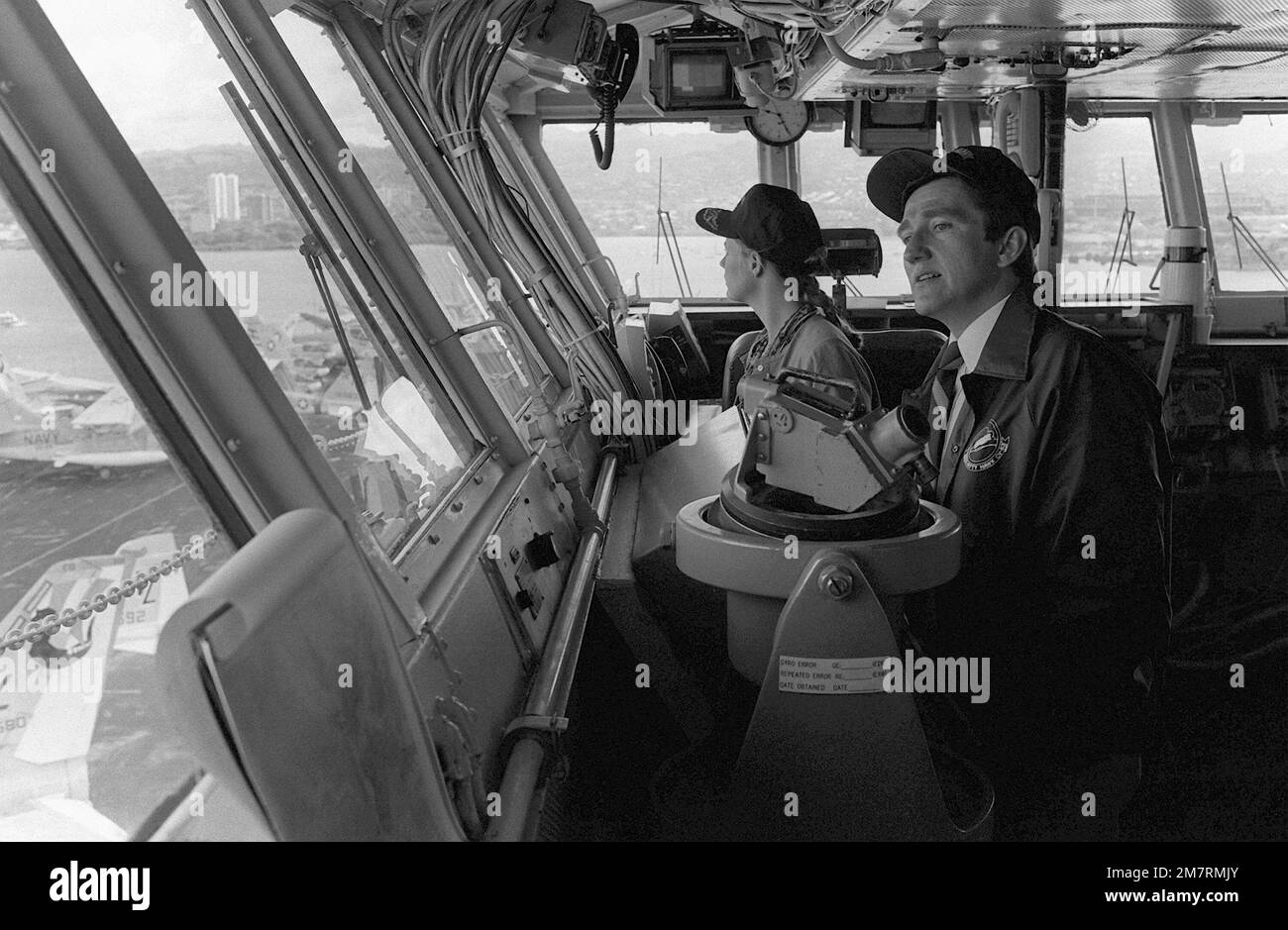 Secretary of the Navy John F. Lehman Jr. and his wife visit the bridge ...