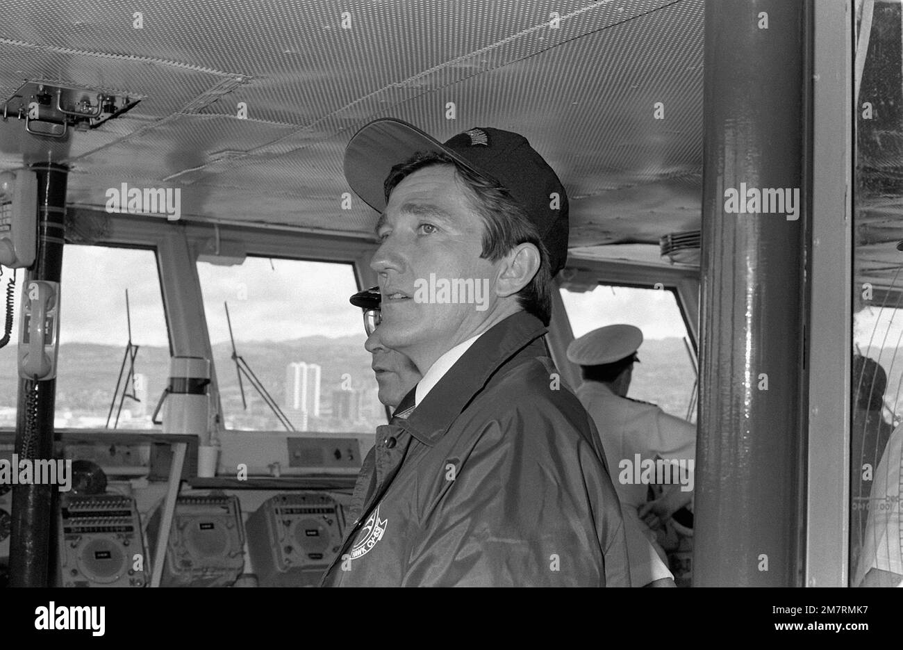 Secretary of the Navy John F. Lehman Jr., visits the bridge of the ...