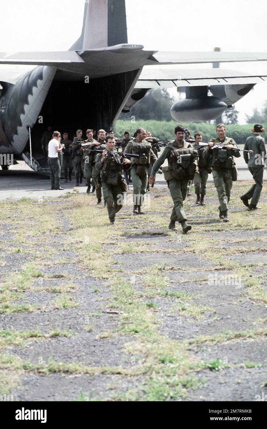 25th Infantry Battalion troops debark a 439th Tactical Airlift Wing C ...