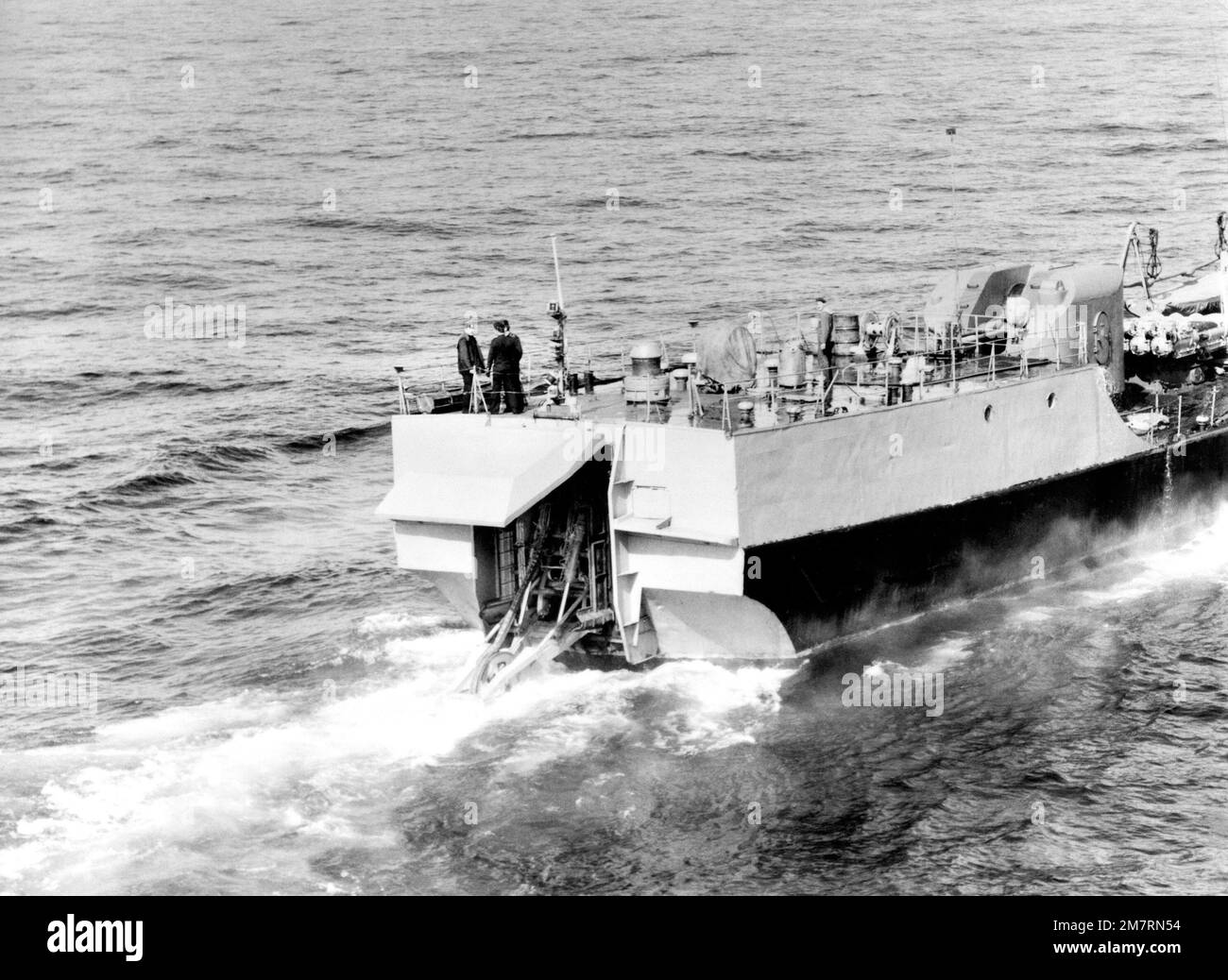 A partial starboard quarter view of a modified Soviet Petya I class ...