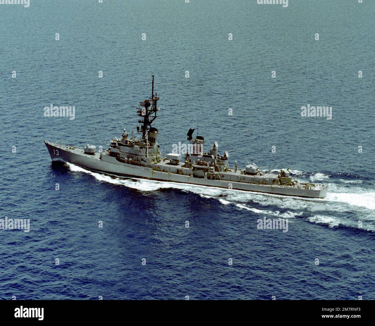 A port view of the guided missile destroyer USS HOEL (DDG-13) underway ...