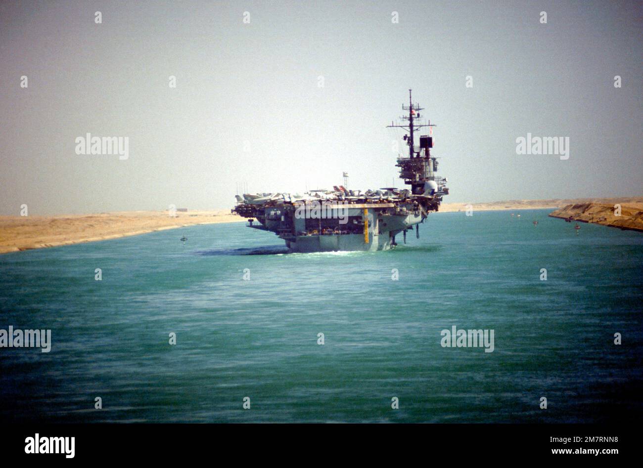 A stern view of the aircraft carrier USS AMERICA (CV-66) during the ...